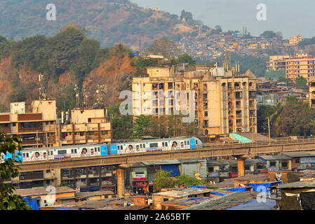 Metro train near Asalpha railway station, Bombay, Mumbai, Maharashtra ...