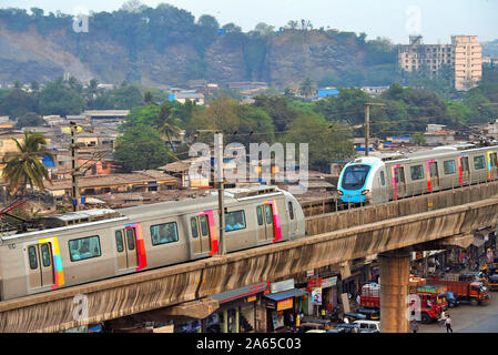 Metro train near Asalpha railway station, Bombay, Mumbai, Maharashtra ...
