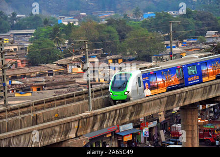 Metro train near Asalpha railway station, Bombay, Mumbai, Maharashtra ...