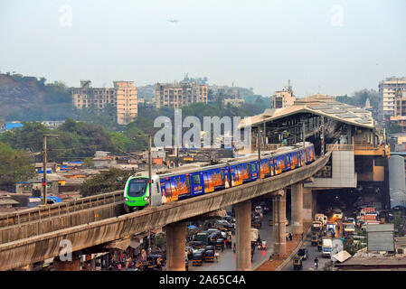Metro train near Asalpha railway station, Bombay, Mumbai, Maharashtra ...