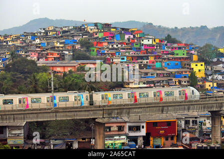 Metro train near Asalpha railway station, Bombay, Mumbai, Maharashtra ...
