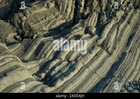 Beach with stacked limestone strata in Ceredigion, Wales,UK Stock Photo ...