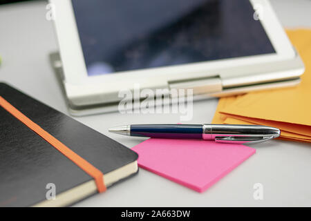 blue leather notepad and red ballpoint pen isolated on white Stock ...
