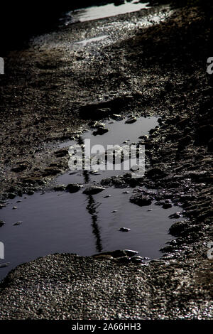 Dangerous potholes on a country lane in the UK Stock Photo - Alamy