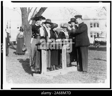 Women police officers inspecting and practicing with handguns Stock ...