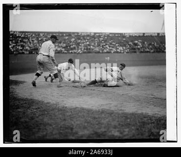 Yankees catcher Wally Schang slides safely into 3rd base in second game ...