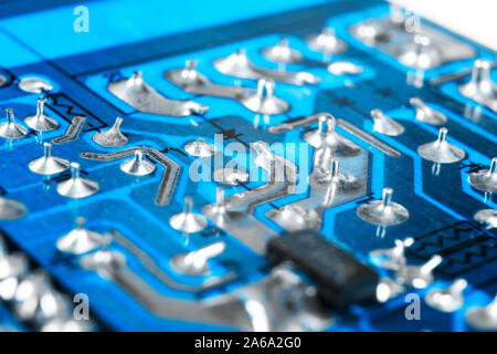 Macro shot of a Circuitboard with resistors microchips and electronic ...