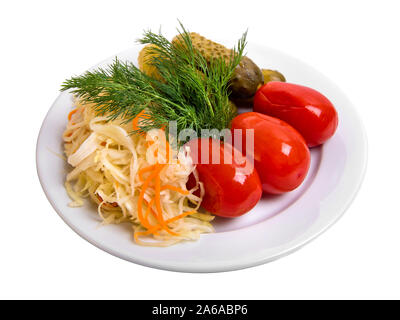 Marinaded tomatoes in a white plate Stock Photo - Alamy