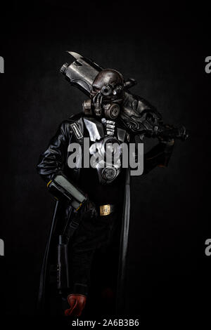 post-apocalyptic warrior in gas mask with machine gun isolated on white ...