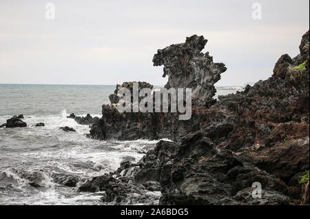 Dragon Head Rock of Jeju Island, South Korea. Known as Yongduam rock in ...