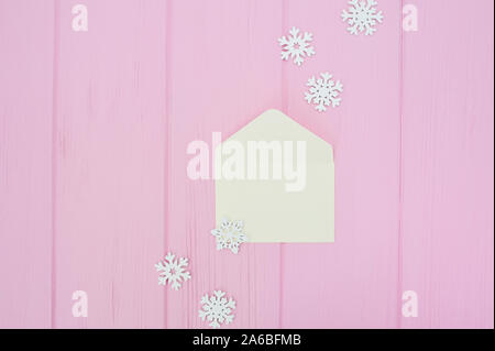 Pink envelope with snowflakes isolated on white background Stock Photo ...