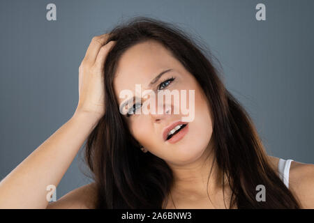 Young Woman Scratching Her Itchy Head Scalp Stock Photo - Alamy