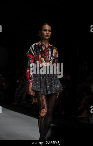 Jakarta, Indonesia. 25th Oct, 2019. Models present creations of Iwa ...