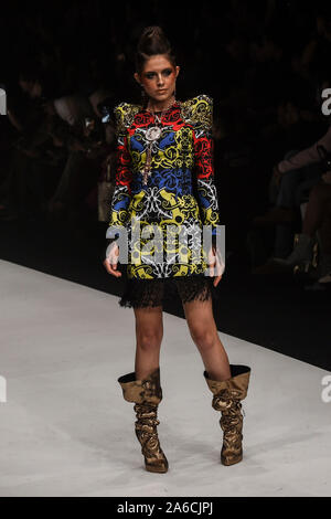 Jakarta, Indonesia. 25th Oct, 2019. Models present creations of Iwa ...