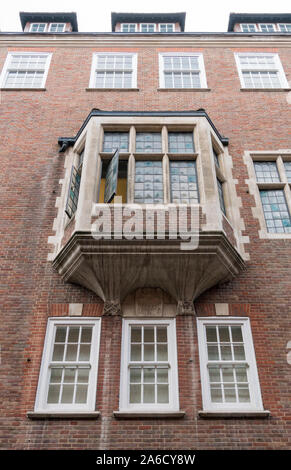 old bay window with leaded glass and black painted frame at historic ...