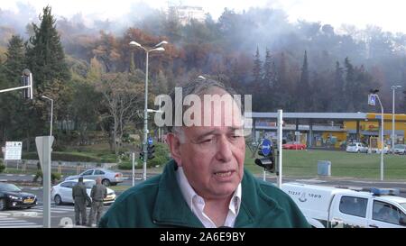 Yona Yahav, Mayor of Haifa, speaks to the press during fires in Haifa ...