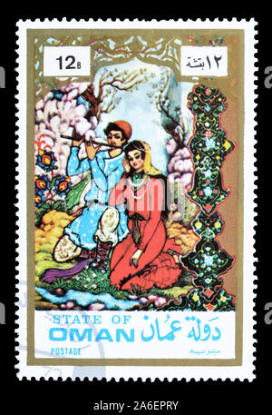 Cancelled postage stamp printed by Oman, that shows Painting of people ...