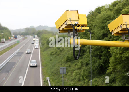 Bright yellow speed cameras in an average speed check area with Stock ...