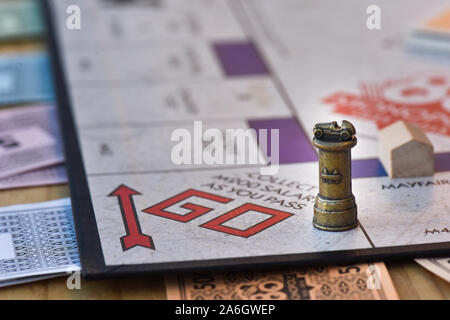 A player lands on the go square while playing a game of Monopoly on the ...