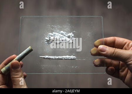 cocaine or speed in a line. addict with euro bill for snorting, drug ...