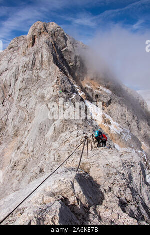 Steep narrow path towards Triglav peak Stock Photo - Alamy