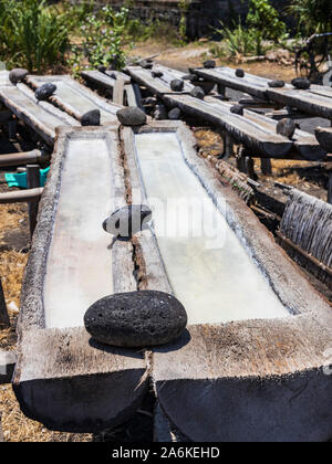 Production of sea salt in the Bali,Indonesia. Salt crystallizes out of ...