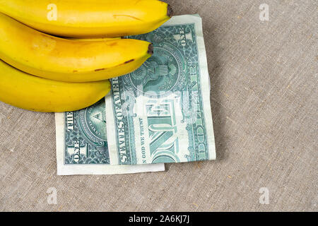 Bananas and money. The concept of a balanced healthy diet cost of ...