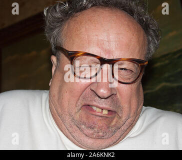 Crazy man scares children Stock Photo - Alamy