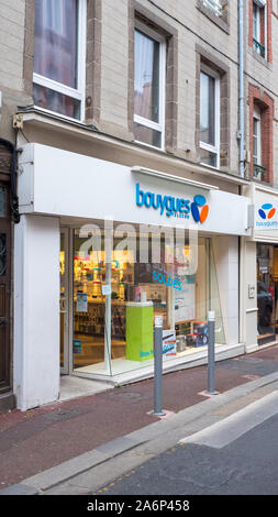 front view of french phone operator : SFR store Granville, France 2019 ...