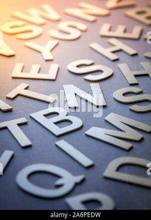 Mixed solid letters pile closeup photo. Education background concept ...