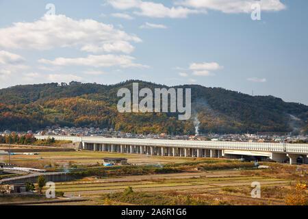 View on japanese countryside with forested hills on background Stock ...