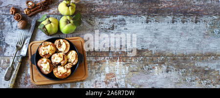 Baked quince with cinnamon and cream cheese. Healthy autumn food. Keto ...