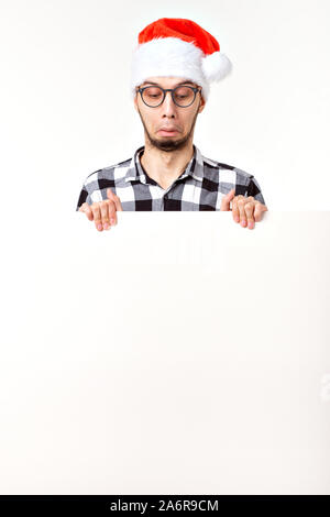 brutal bearded guy in santa claus hat and sweater on christmas eve, new ...