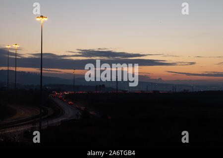 Golden Sunset and cars on road in Bedfordshire, England Stock Photo - Alamy