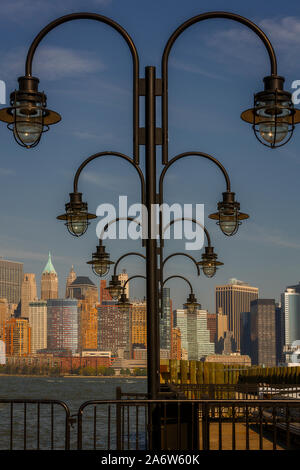 Streetlights and New York City skyline Stock Photo - Alamy