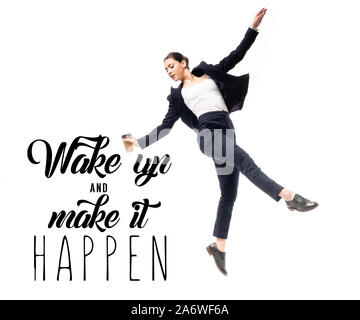 elegant businesswoman dancing while holding coffee to go and newspaper ...