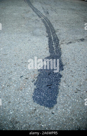 Wheel marks with oil Stock Photo - Alamy
