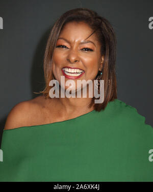 TV news anchor Lori Stokes poses in front a section of the 210 foot ...