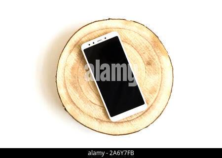 Top view of smartphone mock up on female hands over blue background ...