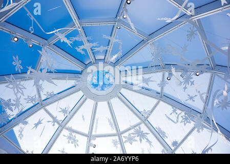 Snowflakes decoration against blue sky Stock Photo - Alamy
