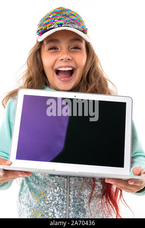 A stylish female freelancer in a yellow sweater and glasses works at ...