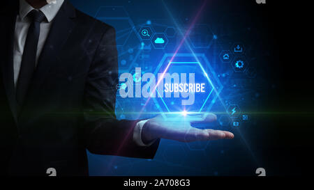 Man hand holding SUBSCRIBE inscription, social media concept Stock ...