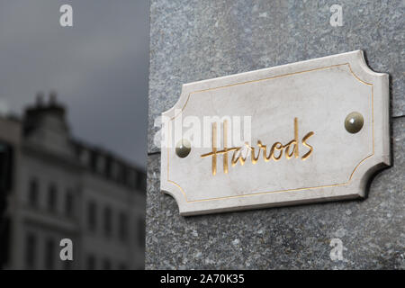 High quality engraved Harrod's department store sign attached to the ...