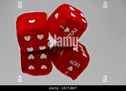 Two red dice with hearts as numbers Stock Photo - Alamy