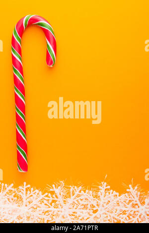orange xmas background candy cane seamless pattern Stock Photo - Alamy
