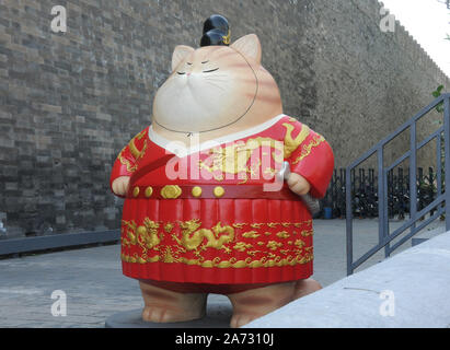 Beijing,CHINA-A giant "Royal cat" is seen near the palace wall outside ...