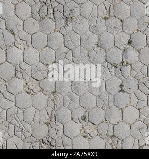 Hexagonal stone background of pavement with grass. Texture of hexagonal ...