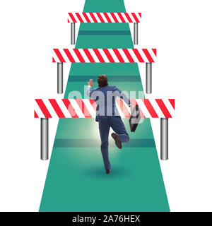 Businessman facing running barriers in challenging business Stock Photo ...