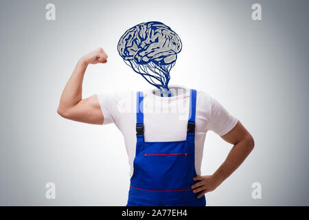 Worker with brain in robotics and automation concept Stock Photo - Alamy