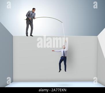 Businessman fishing his colleague in business concept Stock Photo - Alamy